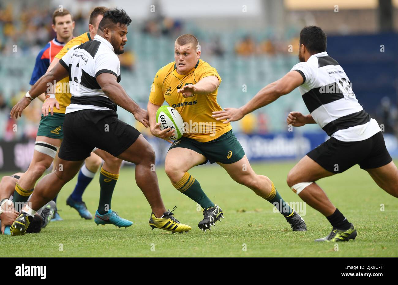 Tom Robertson of the Wallabies runs with the ball during the rugby ...