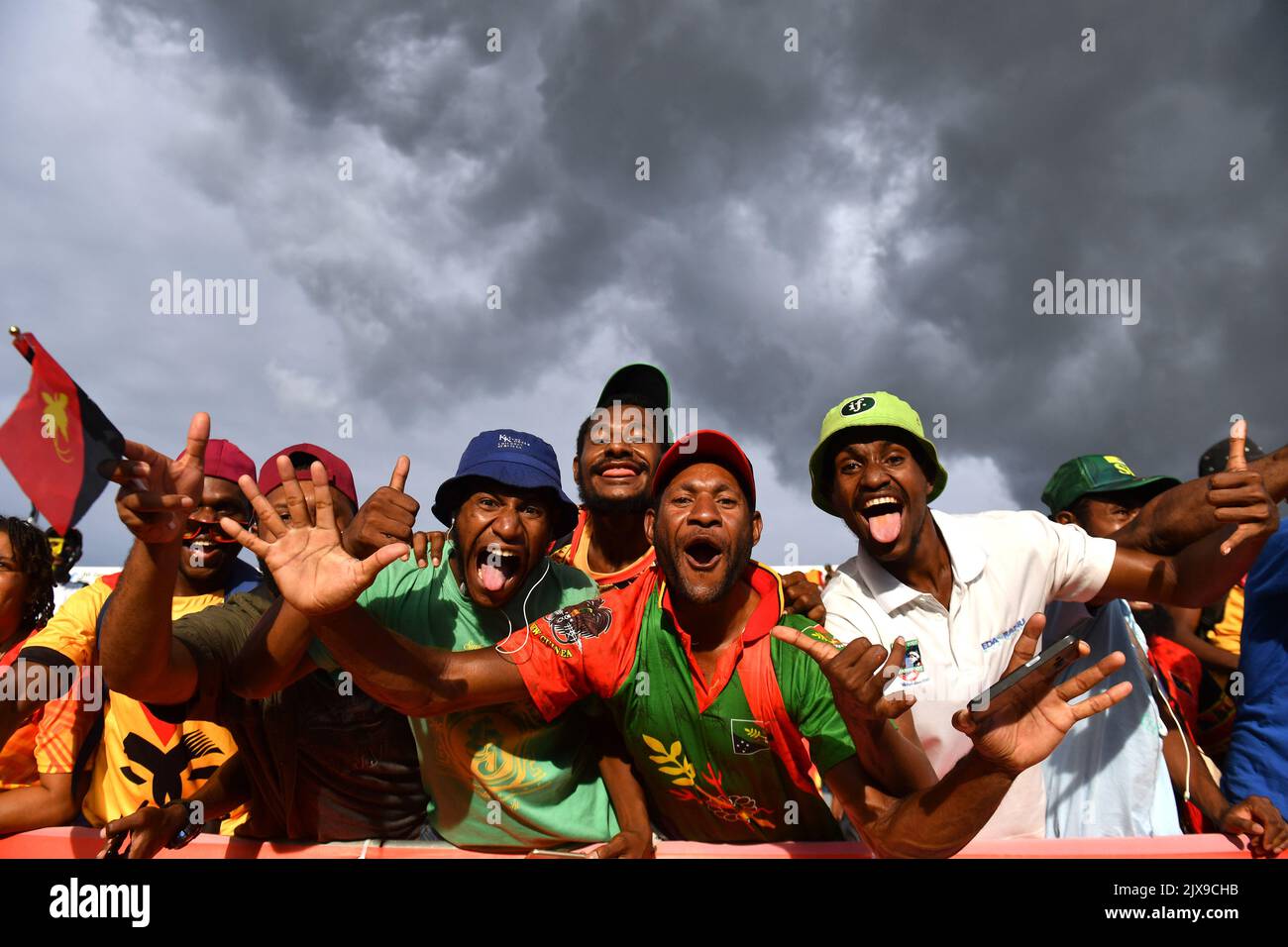 Papua New Guinea team supporters celebrate after their team defeated ...