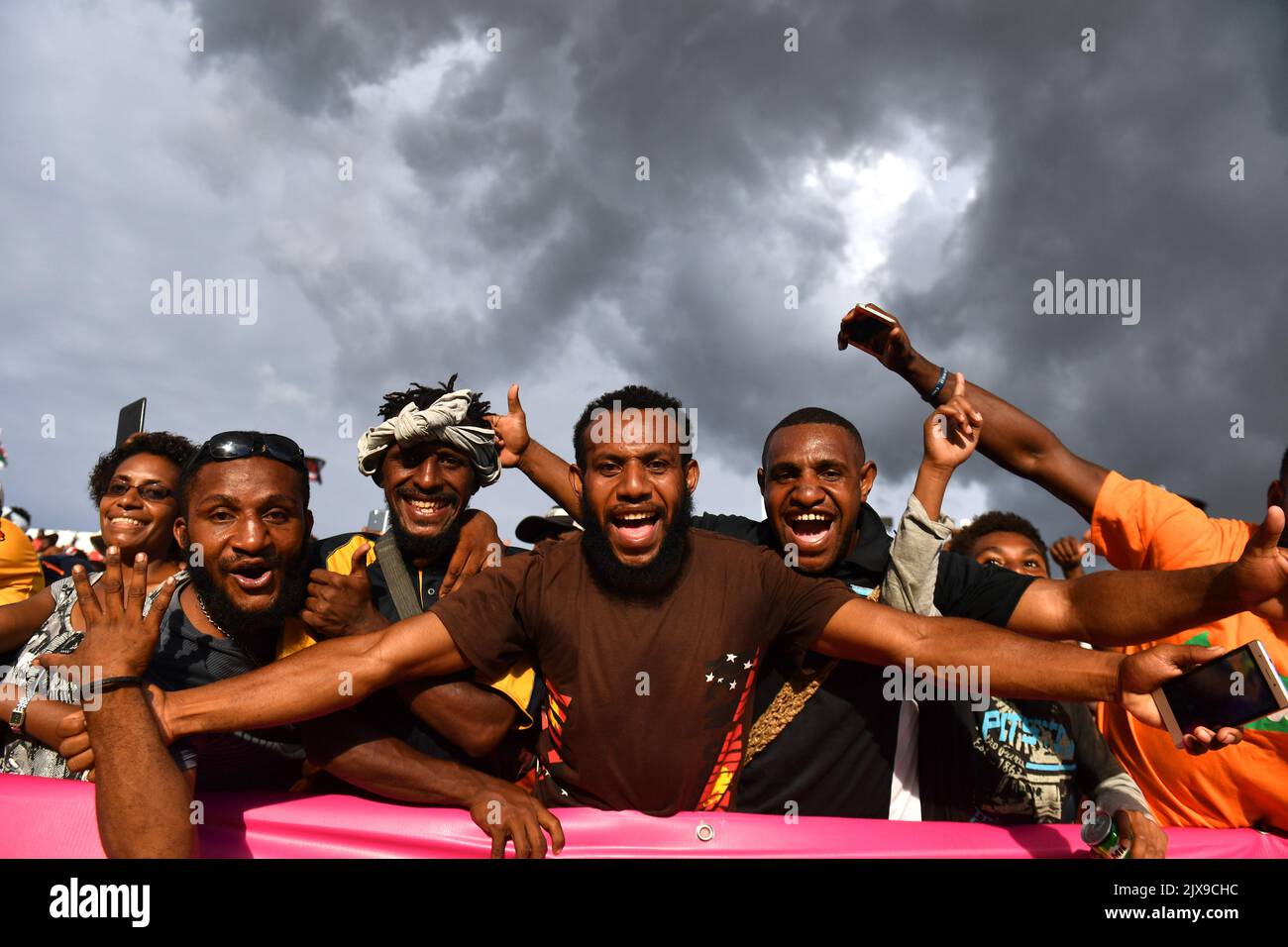 Papua New Guinea team supporters celebrate after their team defeated ...