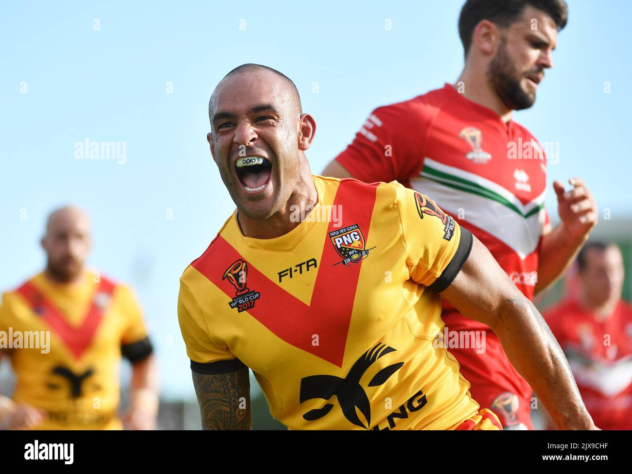 Papua New Guinea's Paul Aiton celebrates after scoring a try during ...