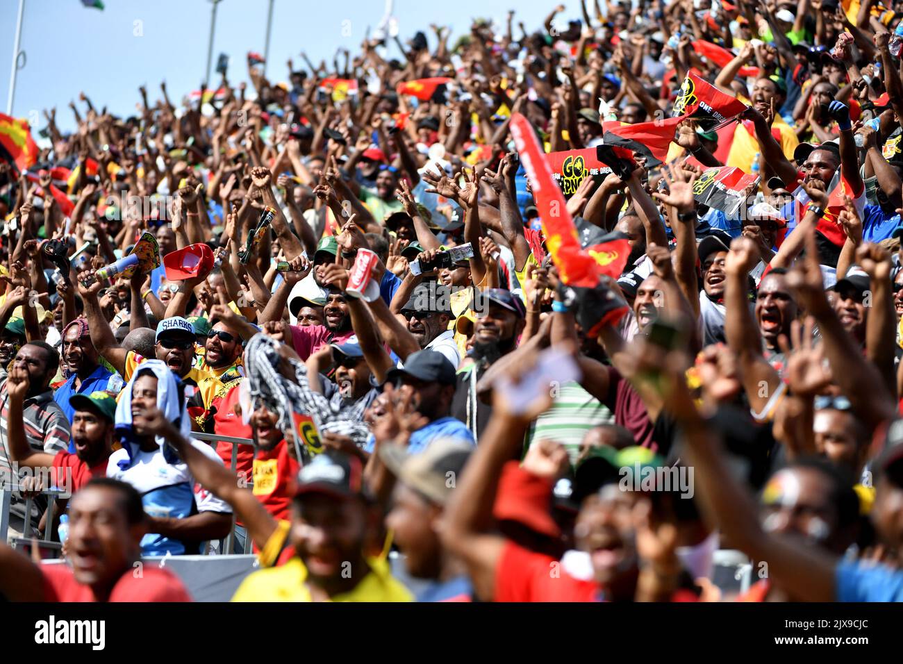 Papua New Guinea team supporters celebrate a try during their Rugby ...