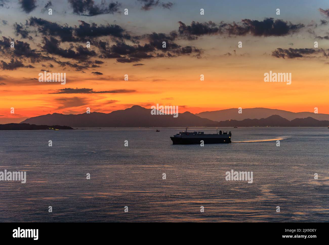 Cargo container ship off coast hi-res stock photography and images - Alamy