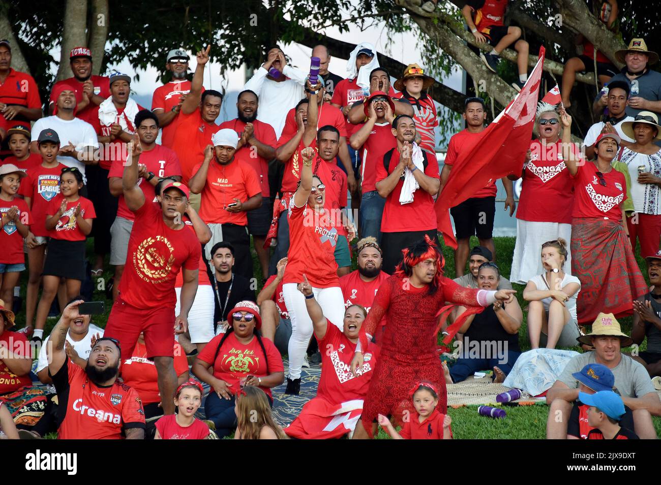 Tonga supporters cheer on and celebrate their team 50-4 win against ...