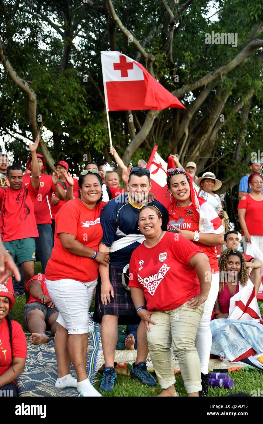 Tongan supporters console a Scottish supporter during Tonga's 50-4 win ...