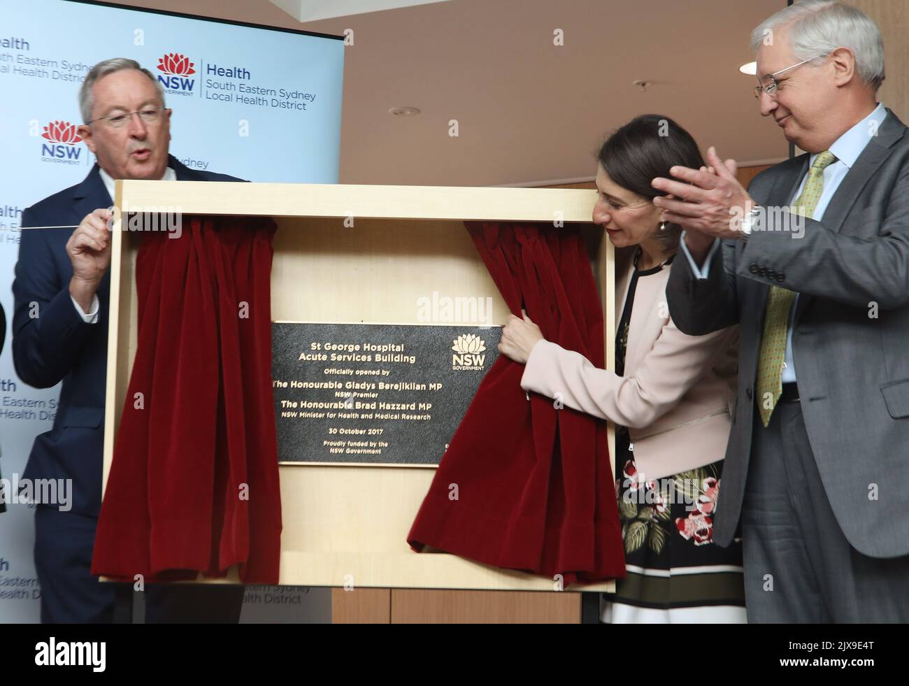 NSW Premier Gladys Berejiklian (2nd right) unveils a placard to the new ...