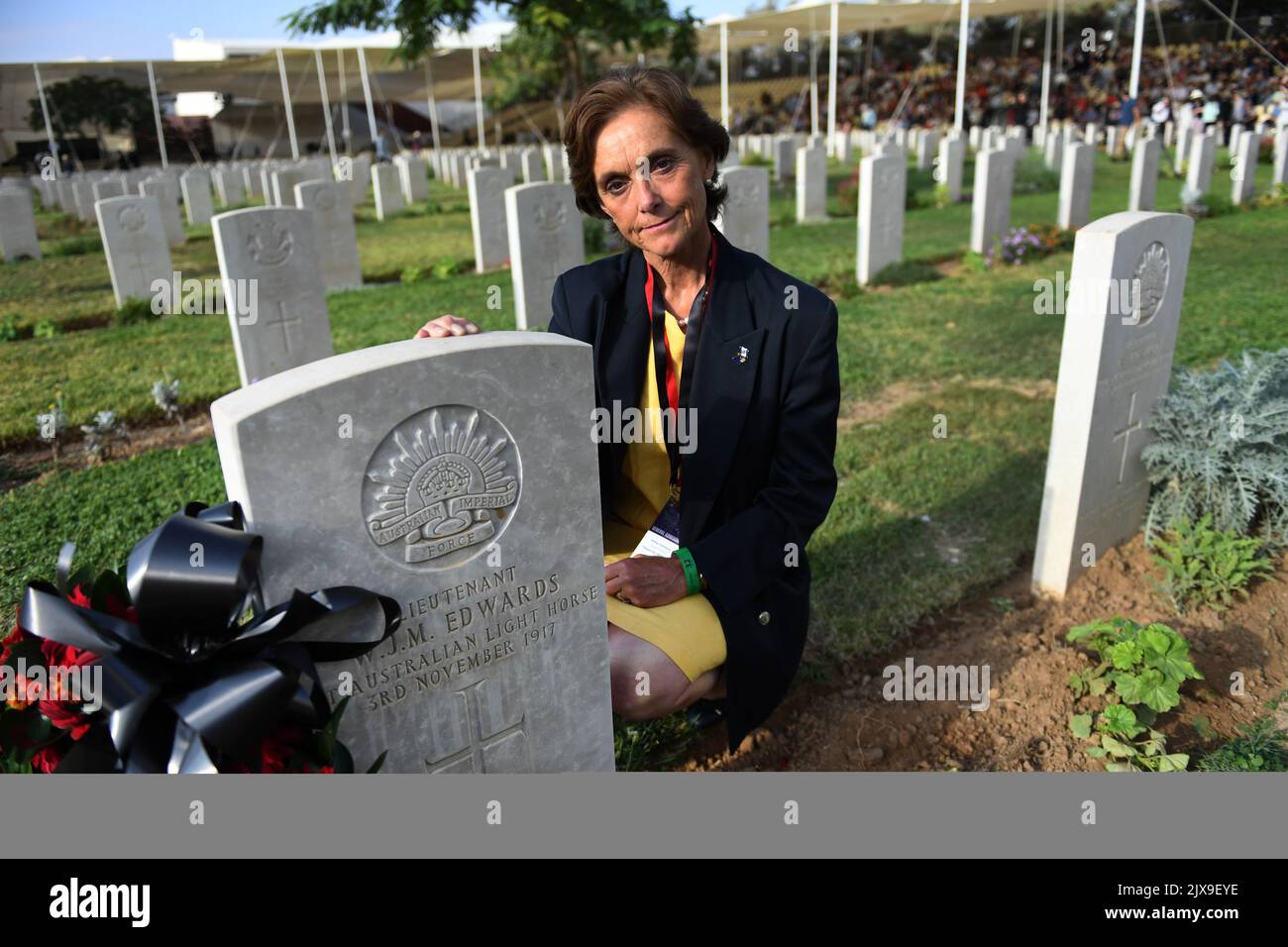 Anthea Sutherland poses next to the grave of her great uncle, Lt ...
