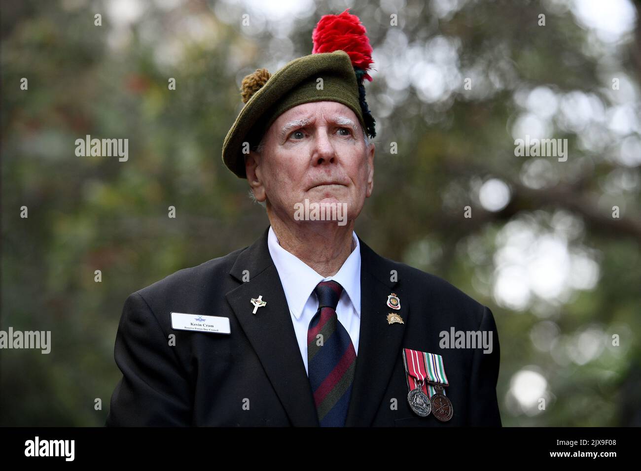 Kevin Cram of the Reserve Forces Council looks on at the unveiling of ...
