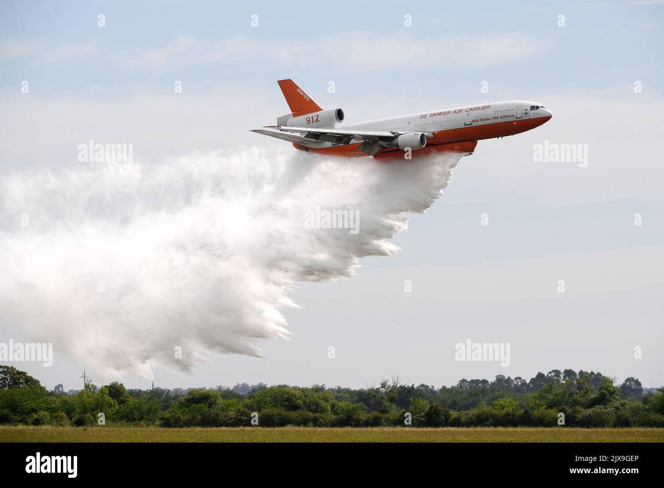 A NSW Rural Fire Service Very Large Air Tanker (VLAT) conducts a water ...