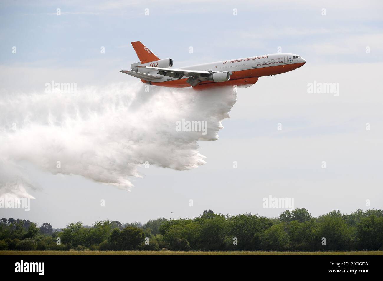 A NSW Rural Fire Service Very Large Air Tanker (VLAT) conducts a water ...