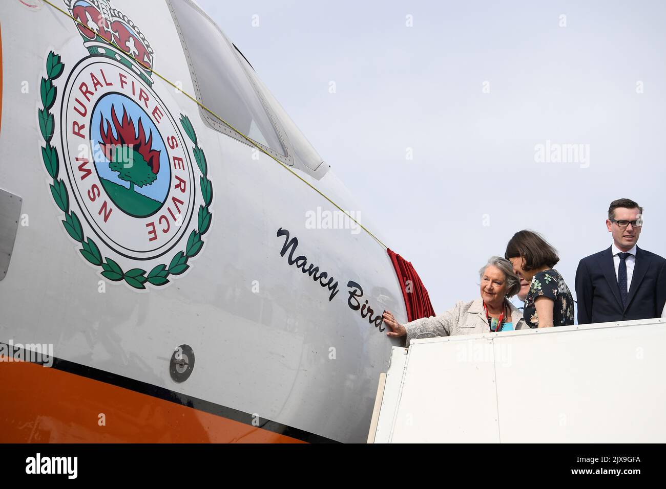 NSW Premier Gladys Berejiklian (centre) and Anne Marie Holman, the ...
