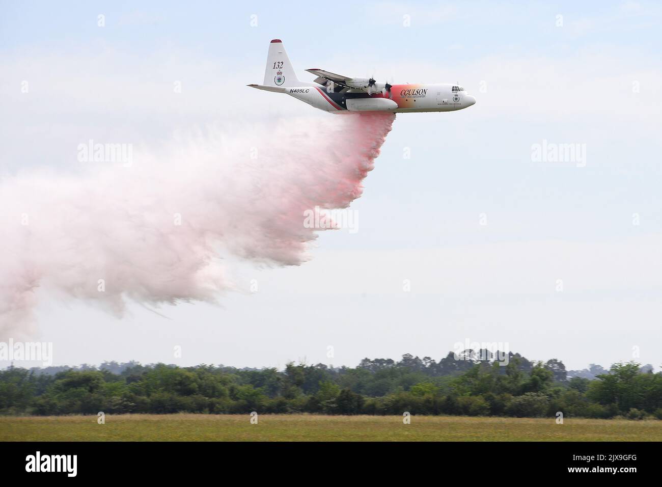 A NSW Rural Fire Service Large Air Tanker (LAT) 'Thor' conducts a water ...