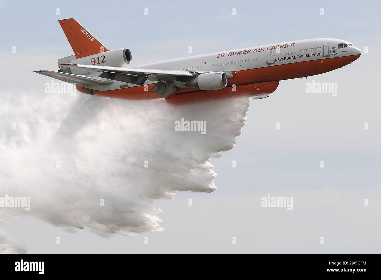 A NSW Rural Fire Service Very Large Air Tanker (VLAT) conducts a water ...