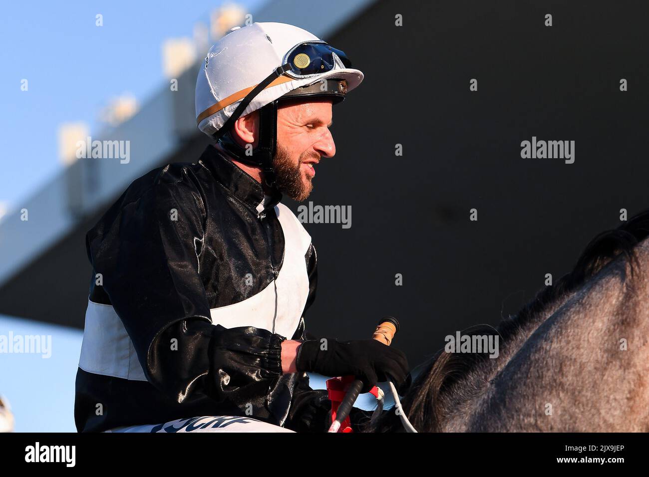 Jockey Larry Cassidy returns to scale after riding Miss Miao to win ...