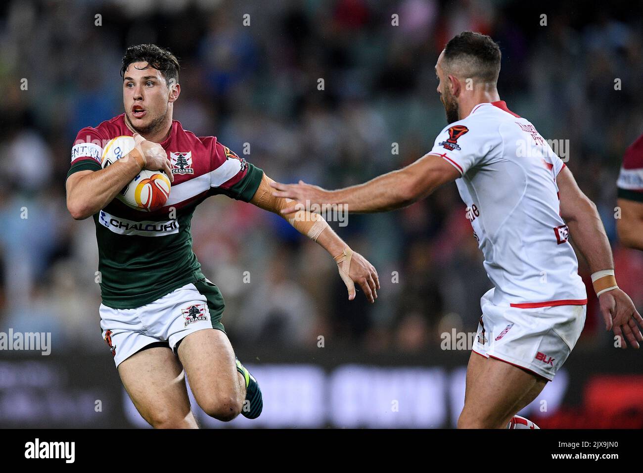 Mitchell Moses of Lebanon makes a break during the Pool A Rugby League ...
