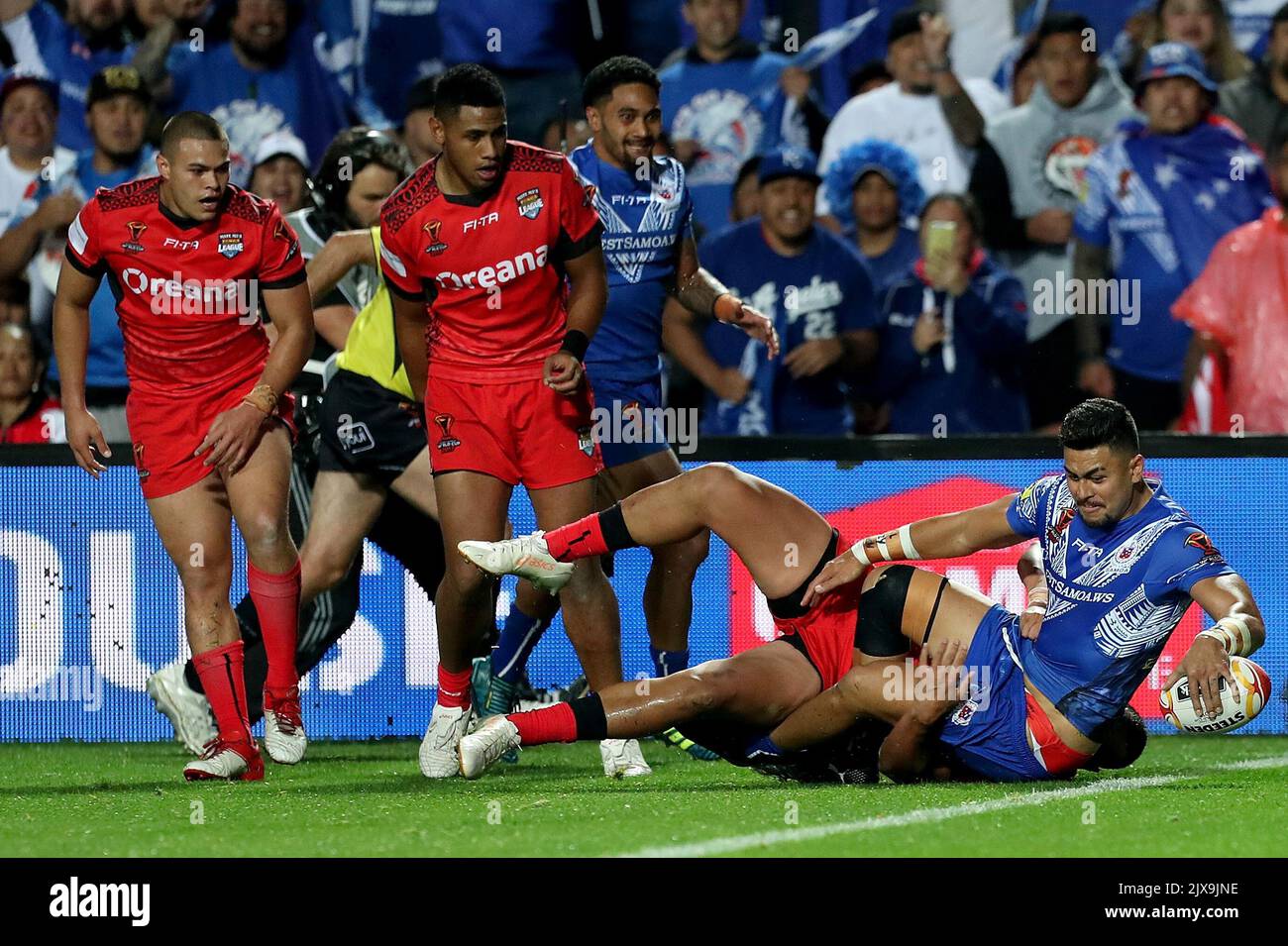 Timoteo Lafai of Samoa scores a try during the Rugby League World Cup ...