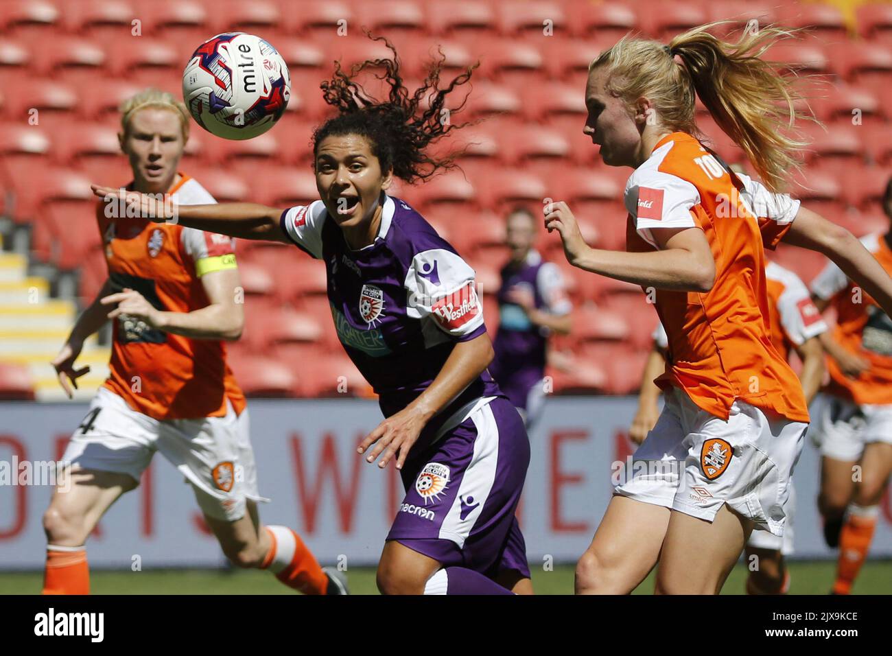 Raquel Rodriguez (centre) of the Glory heads the ball during the round ...