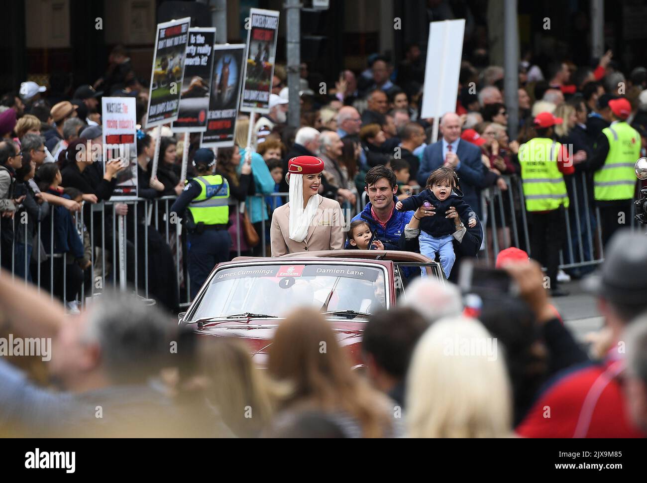 James Cummings and his children are seen as the Melbourne Cup Parade ...
