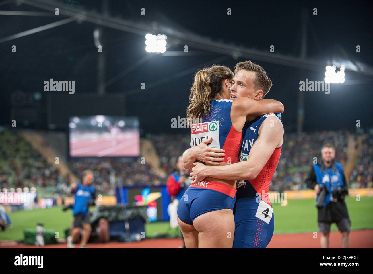 Karsten Warholm hugging his friend Amelie Luel after winning the ...