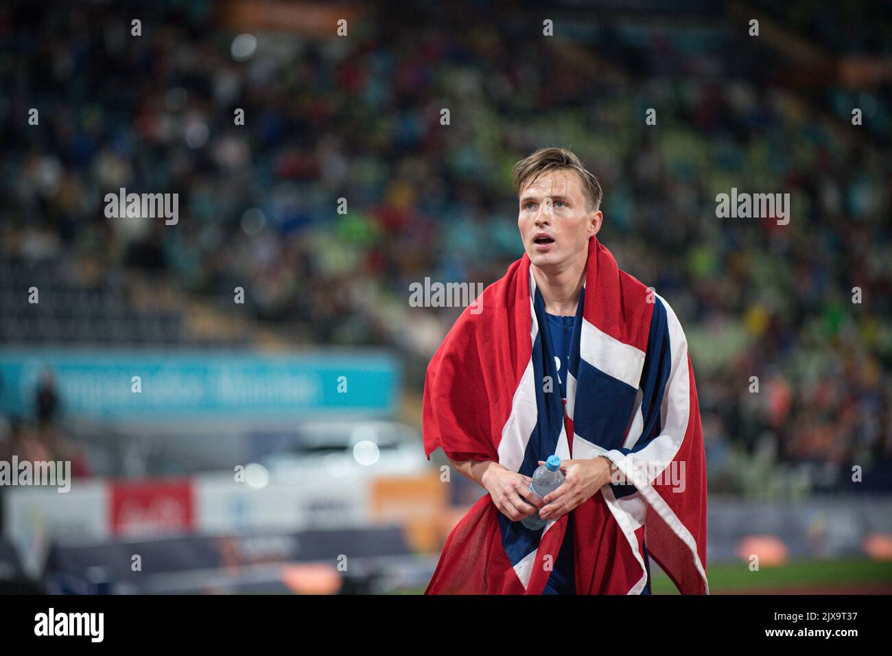 Karsten Warholm with her country's flag as the winner of the 400 meters hurdles at the European ...