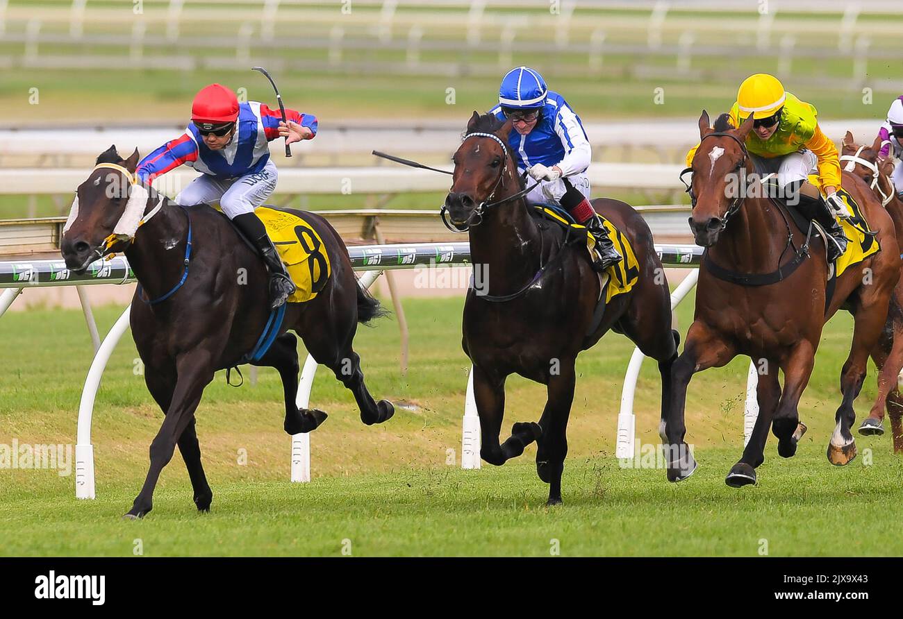 Jockey Michael Murphy rides Amanaat (left) to win race 7, the Class 6 ...