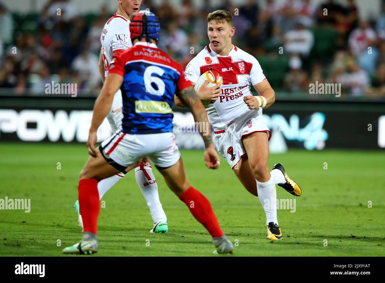 George Williams of England runs the ball during the Rugby League World ...