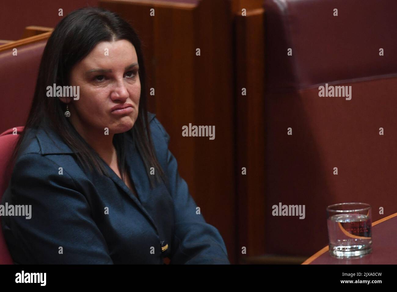 Tasmanian Senator Jacqui Lambie reacts after delivering a statement on ...