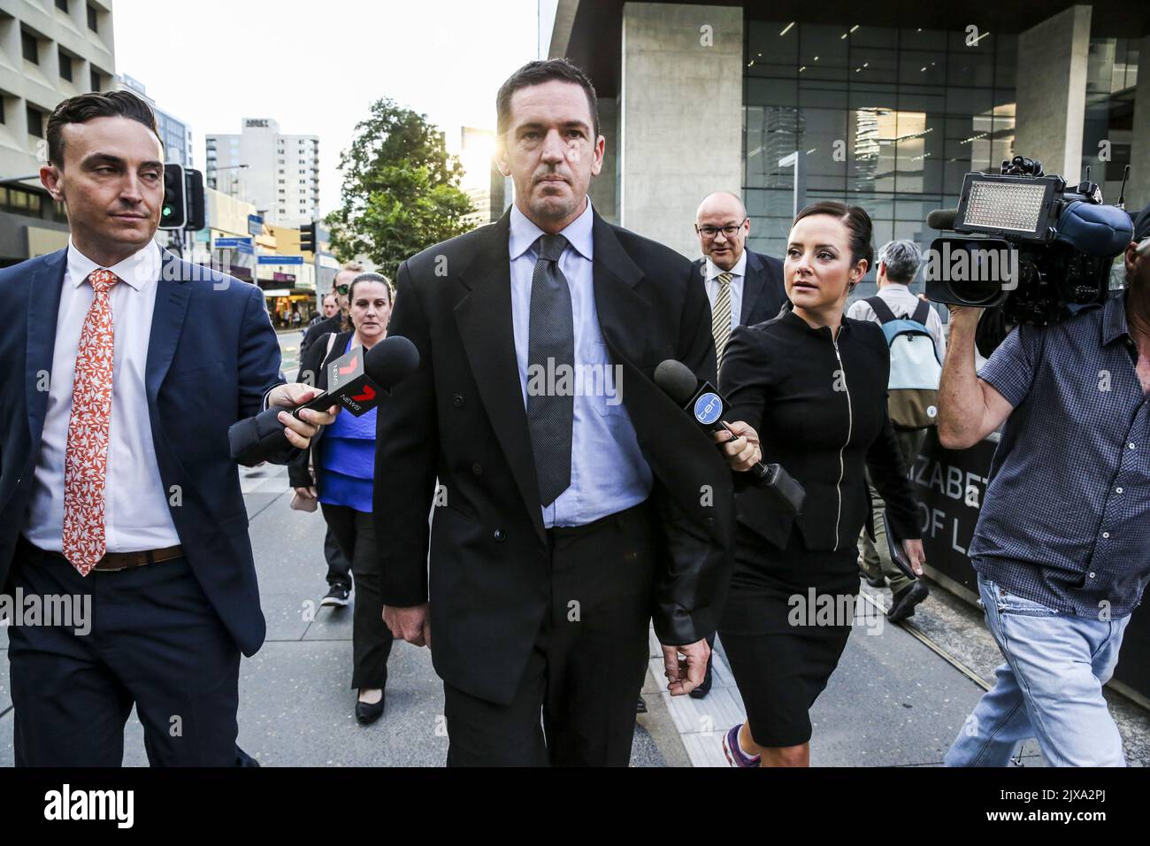 Former soldier Christopher Carter (centre) leaves the Brisbane Supreme ...