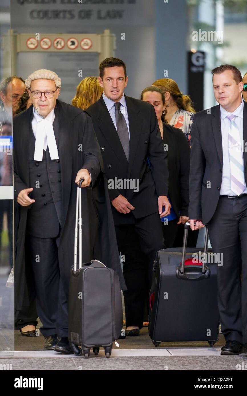 Former soldier Christopher Carter (centre) leaves the Brisbane Supreme ...