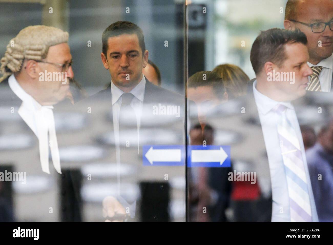 Former soldier Christopher Carter (centre) leaves the Brisbane Supreme ...