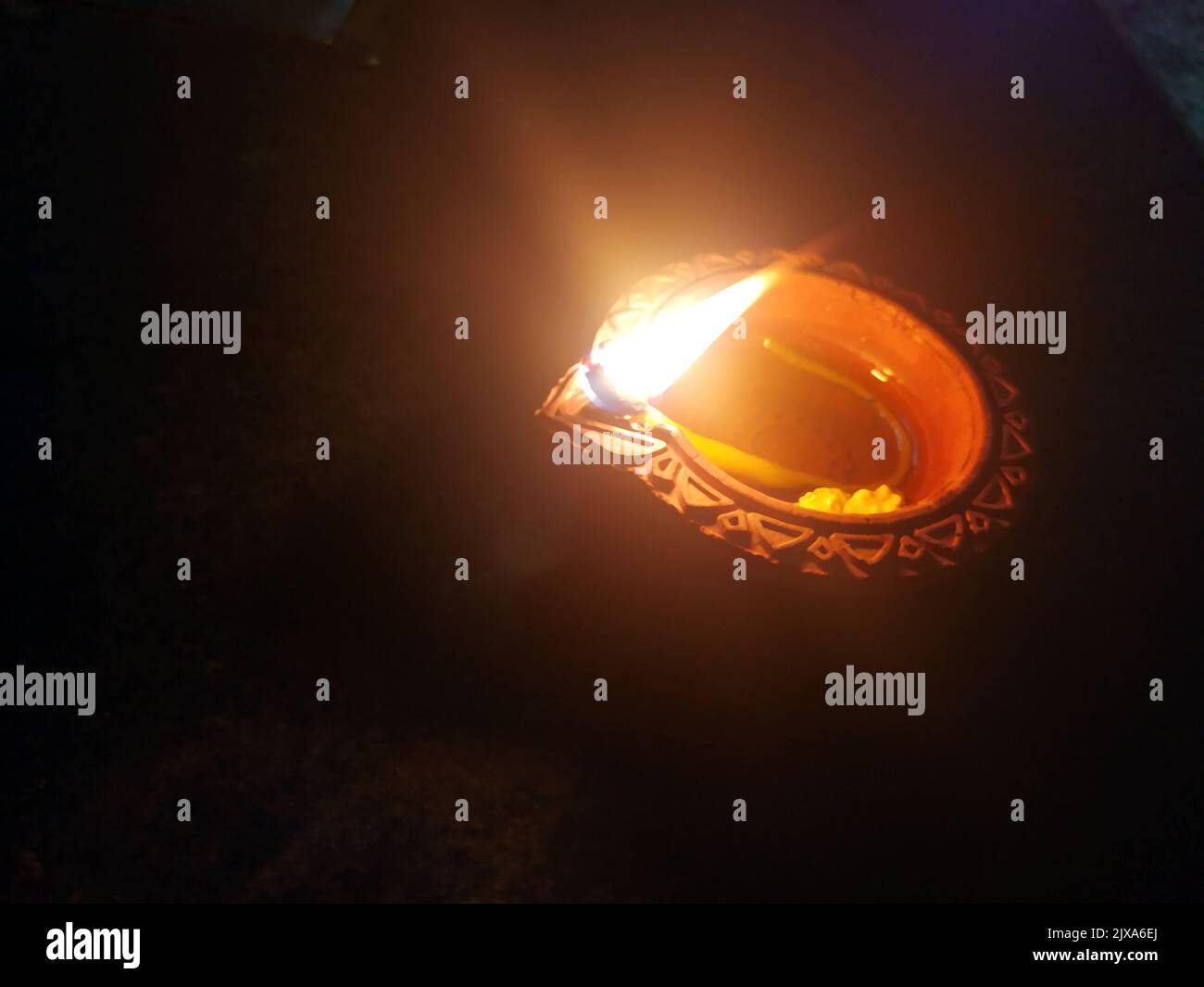 Diya worship hi-res stock photography and images - Alamy