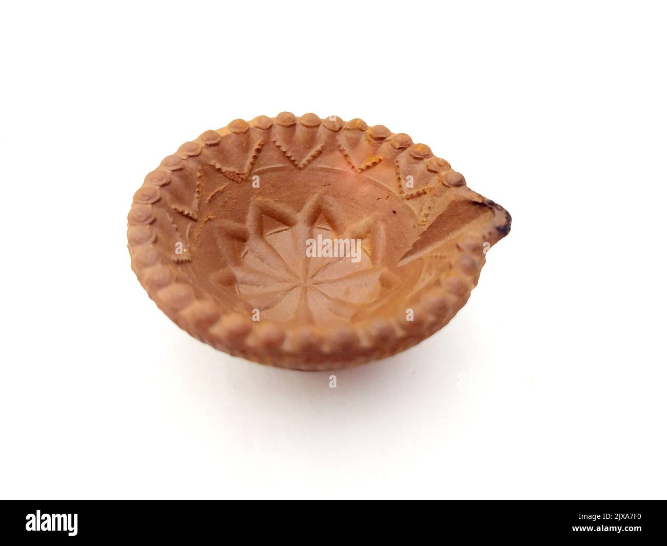 Traditional clay diya lamps lit during diwali celebration Stock Photo ...