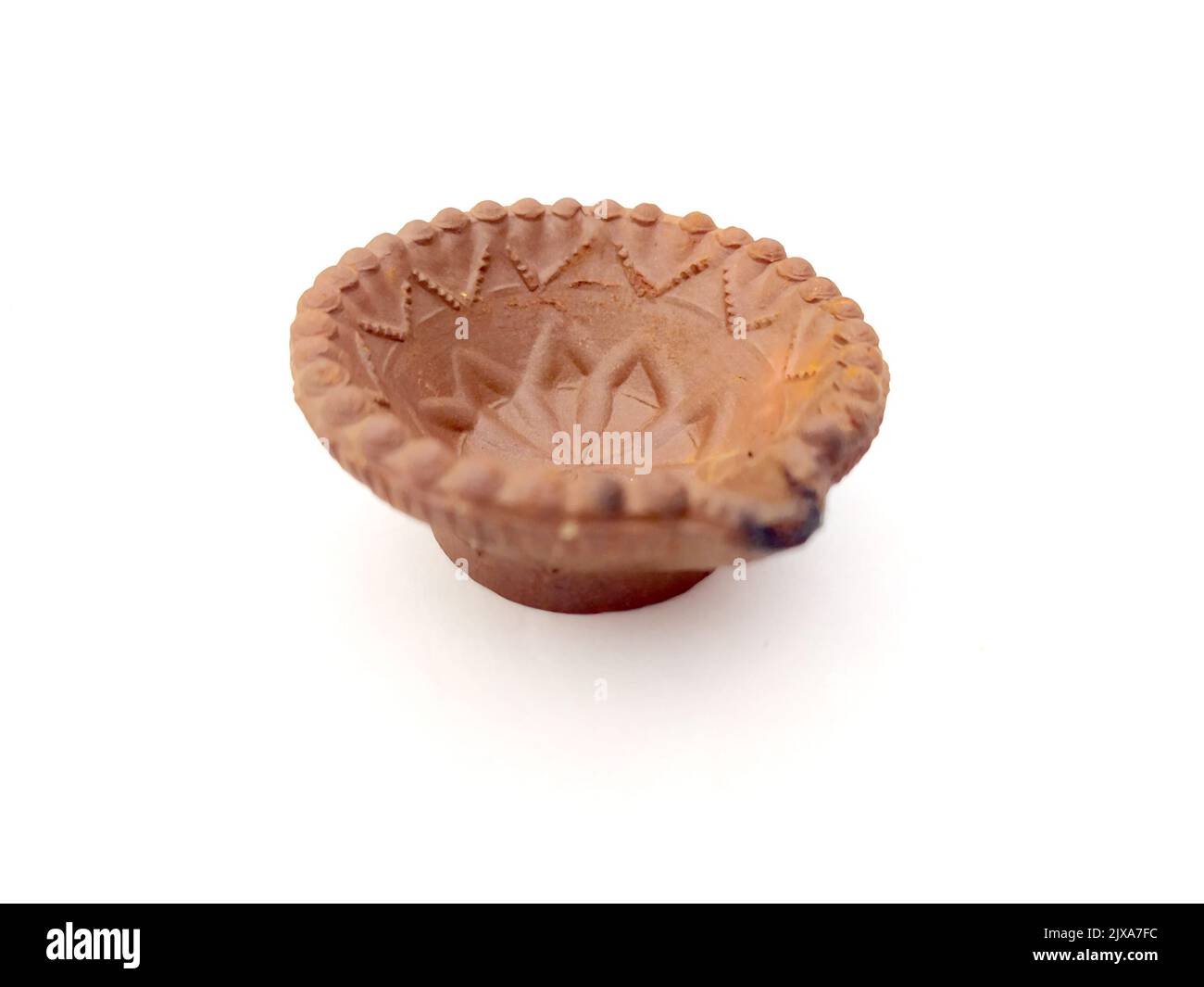 Traditional clay diya lamps lit during diwali celebration Stock Photo ...