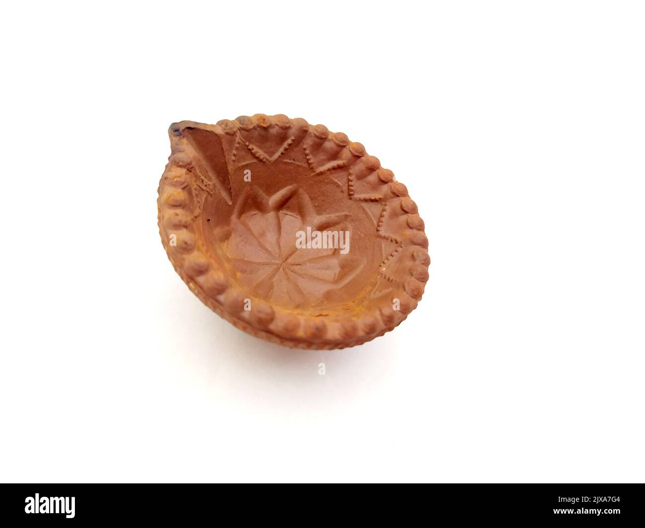 Traditional clay diya lamps lit during diwali celebration Stock Photo ...