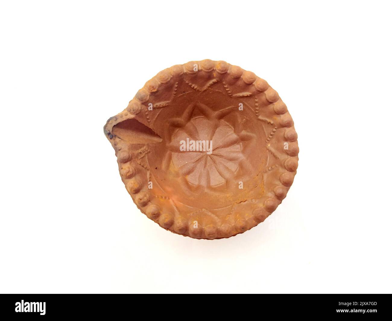 Traditional clay diya lamps lit during diwali celebration Stock Photo ...