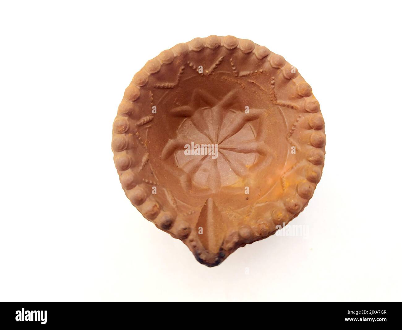 Traditional clay diya lamps lit during diwali celebration Stock Photo ...