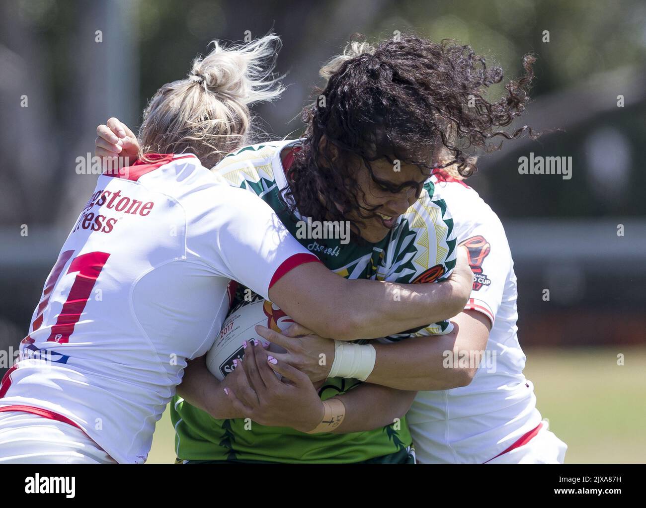 Te Amohaere Ngata-Aerengamate of Cook Islands is tackled during the ...