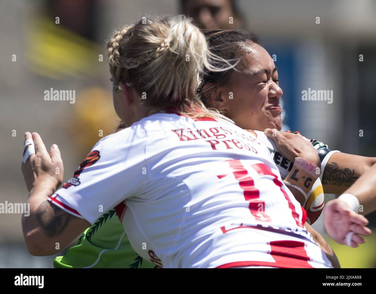 Urshla Kere of Cook Islands is tackled during the Women's Rugby League ...