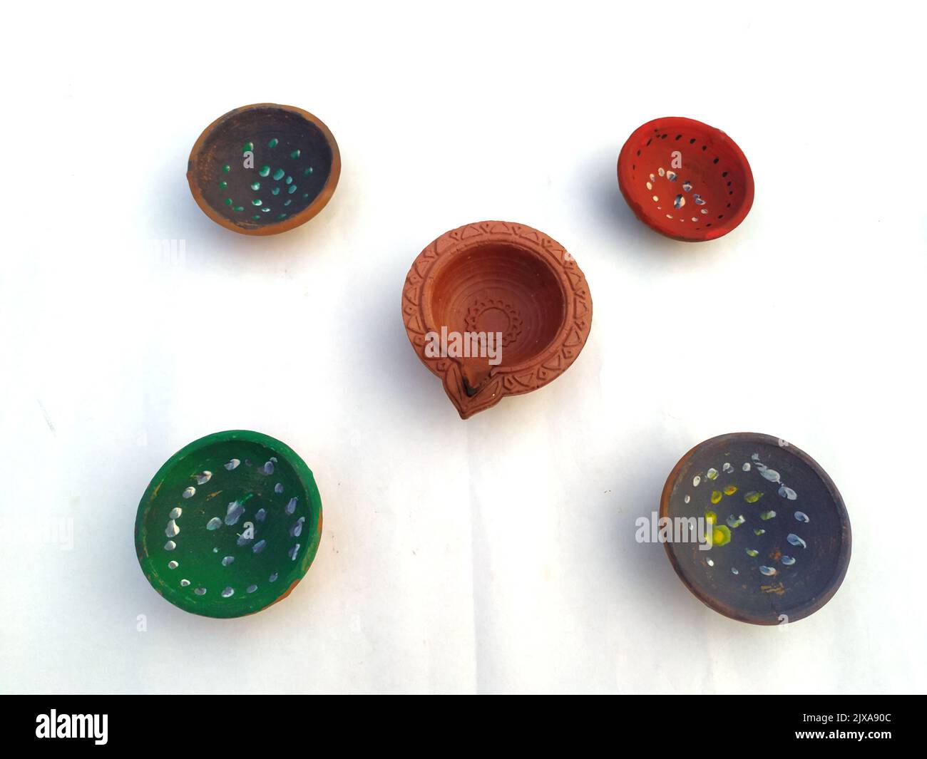 Traditional clay diya lamps lit during diwali celebration Stock Photo ...