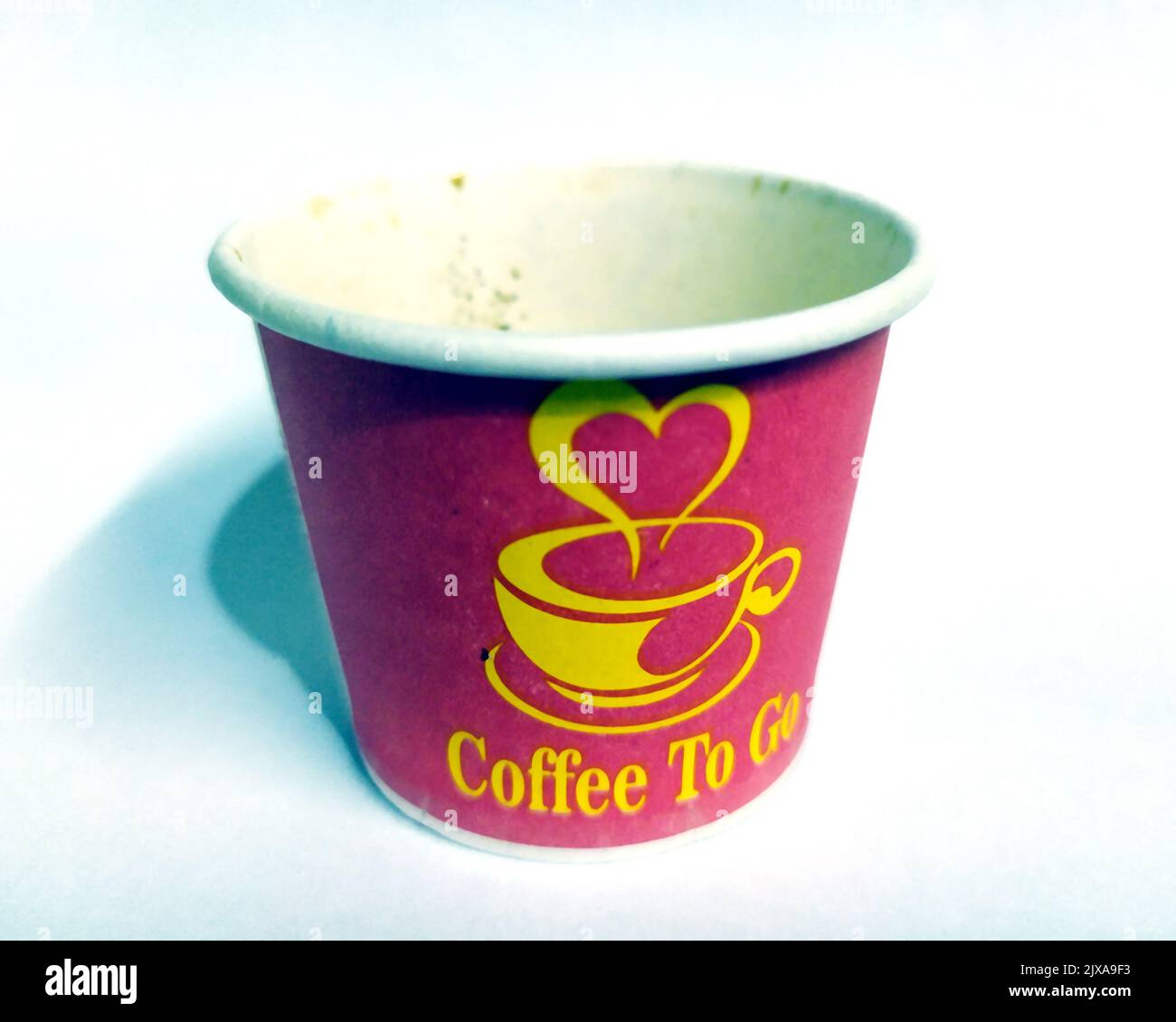 a yellow vecant paper tea cup put on isolated on white background Stock ...