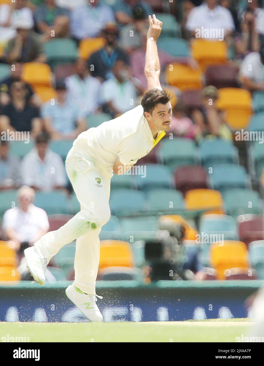 Australian bowler Pat Cummins bowls the ball on Day 2 of the First Test ...