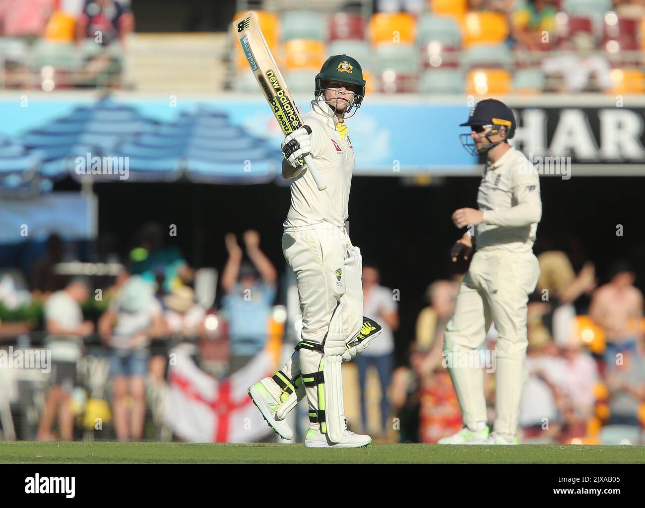 Australian batsman Steve Smith celebrates after scoring a half century ...