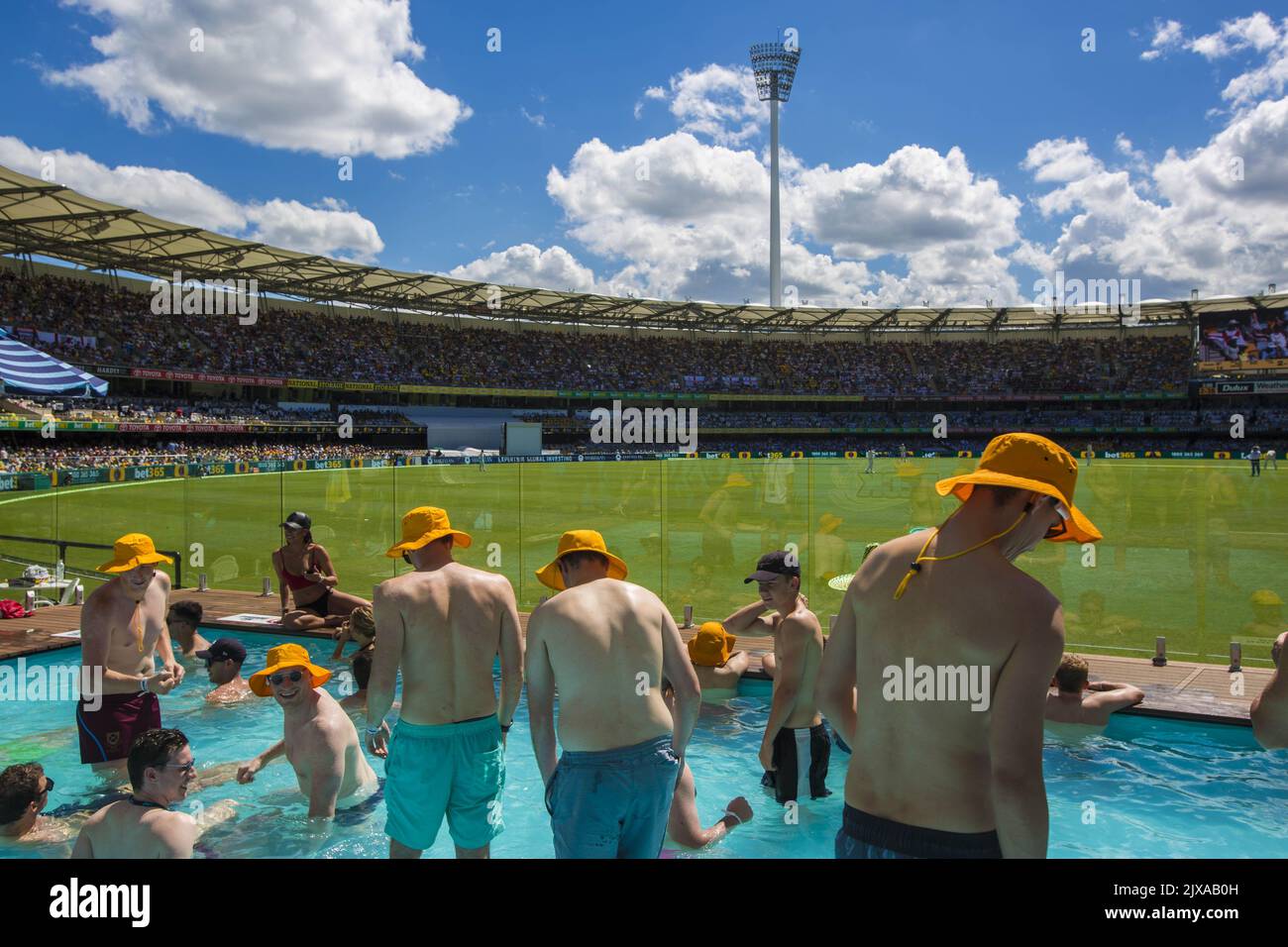 Cricket fans in the pool during Day 2 of the First Test match between ...