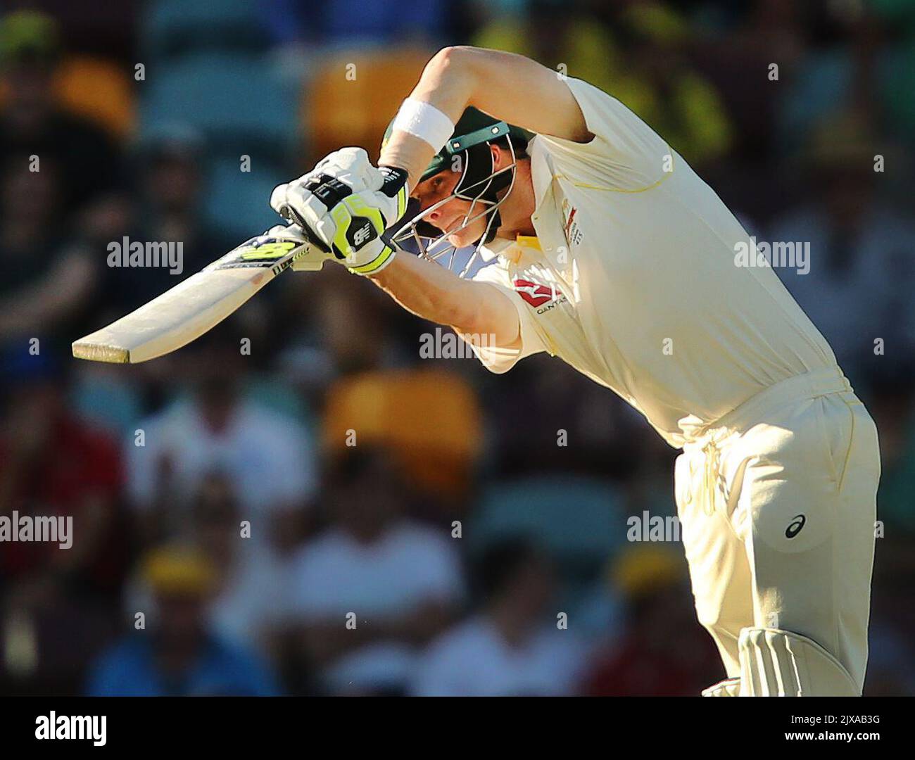Australian batsman Steve Smith plays a shot on Day 2 of the first Test ...