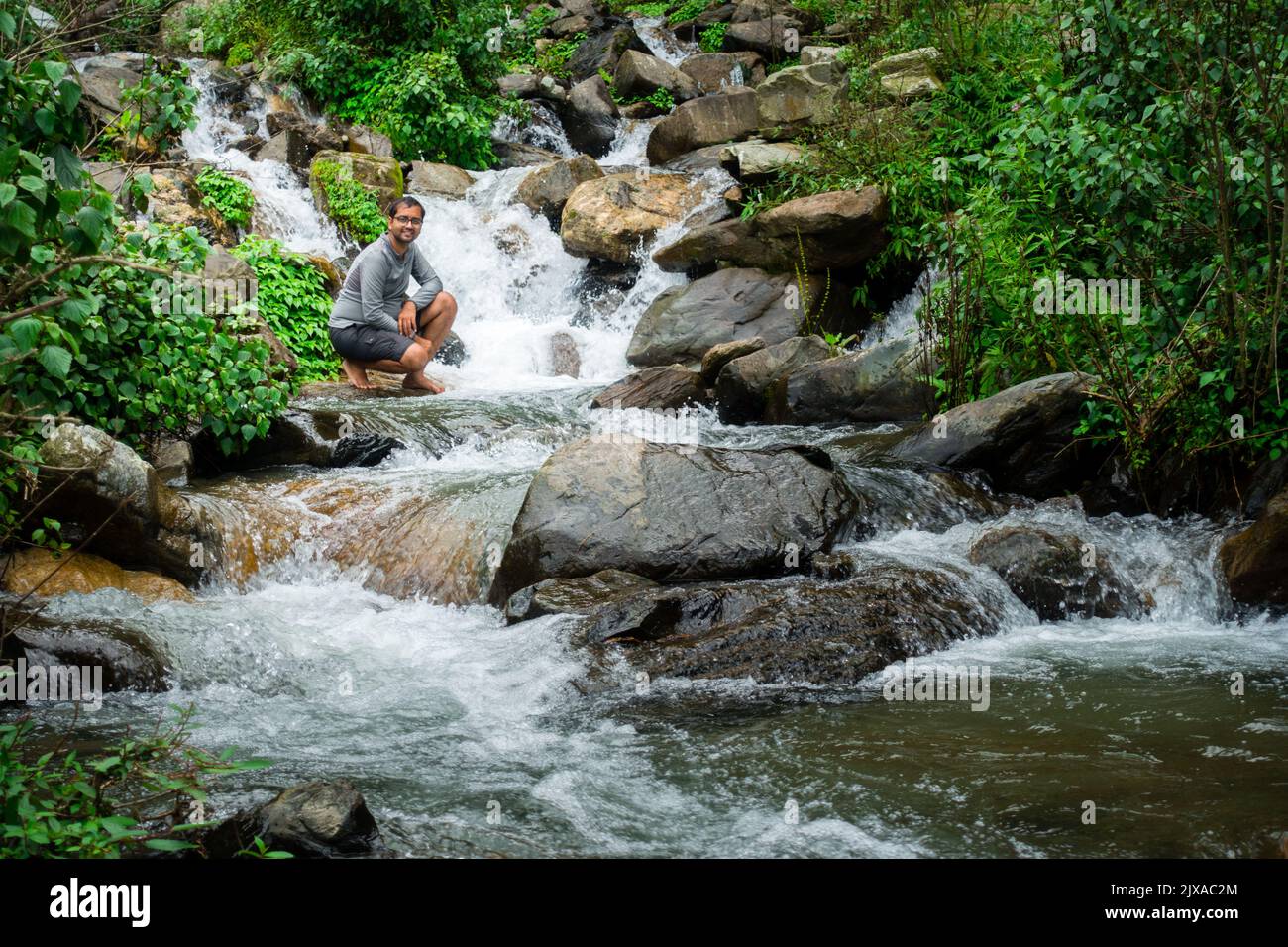 September 17th 2021 Himalayas Uttarakhand India. A man enjoying a river ...
