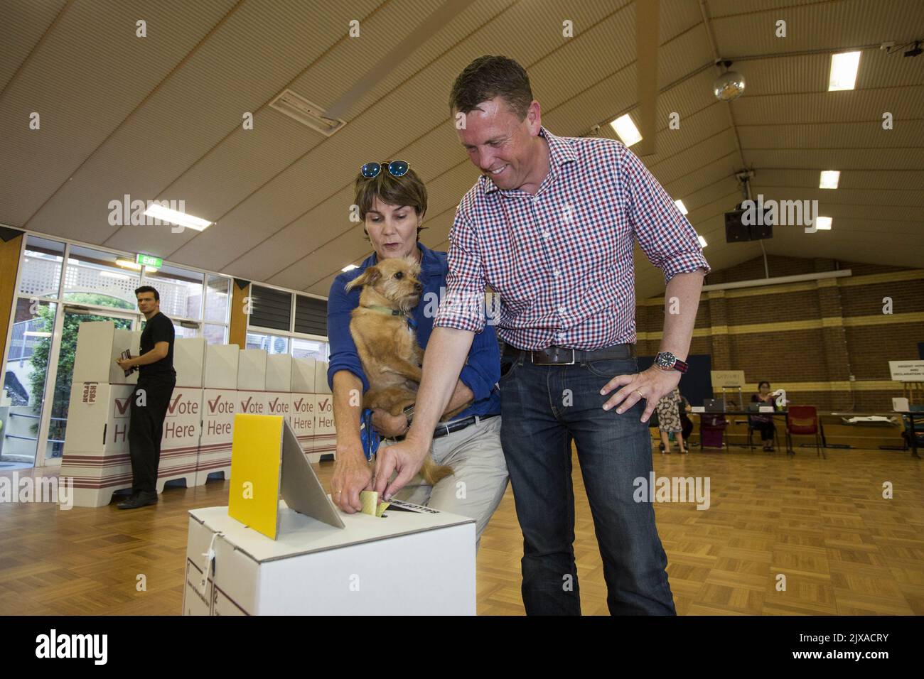 LNP member Scott Emerson with his wife Robyn and dog Taffy vote at ...