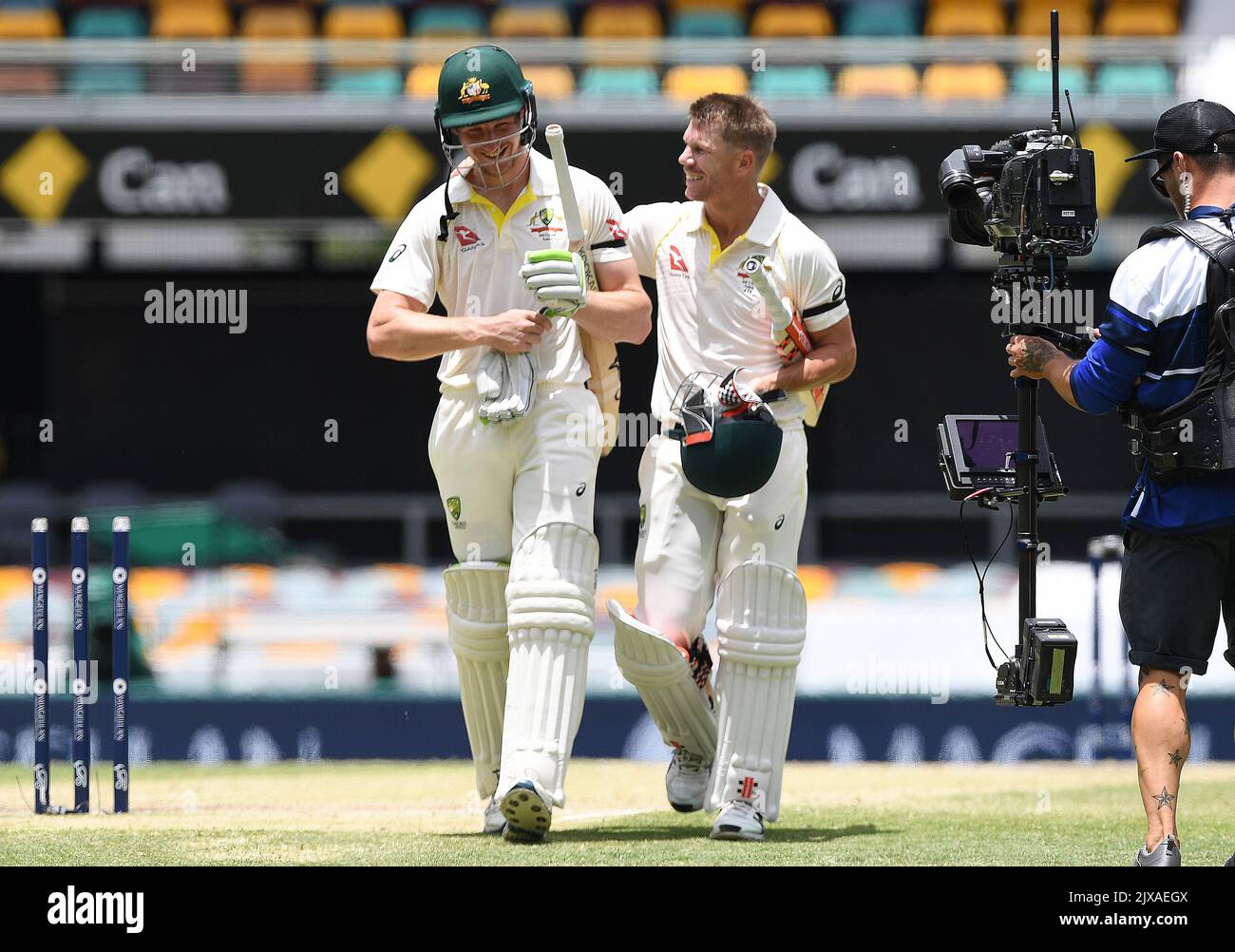 Australian batsmen David Warner (right) and Cameron Bancroft walk from ...