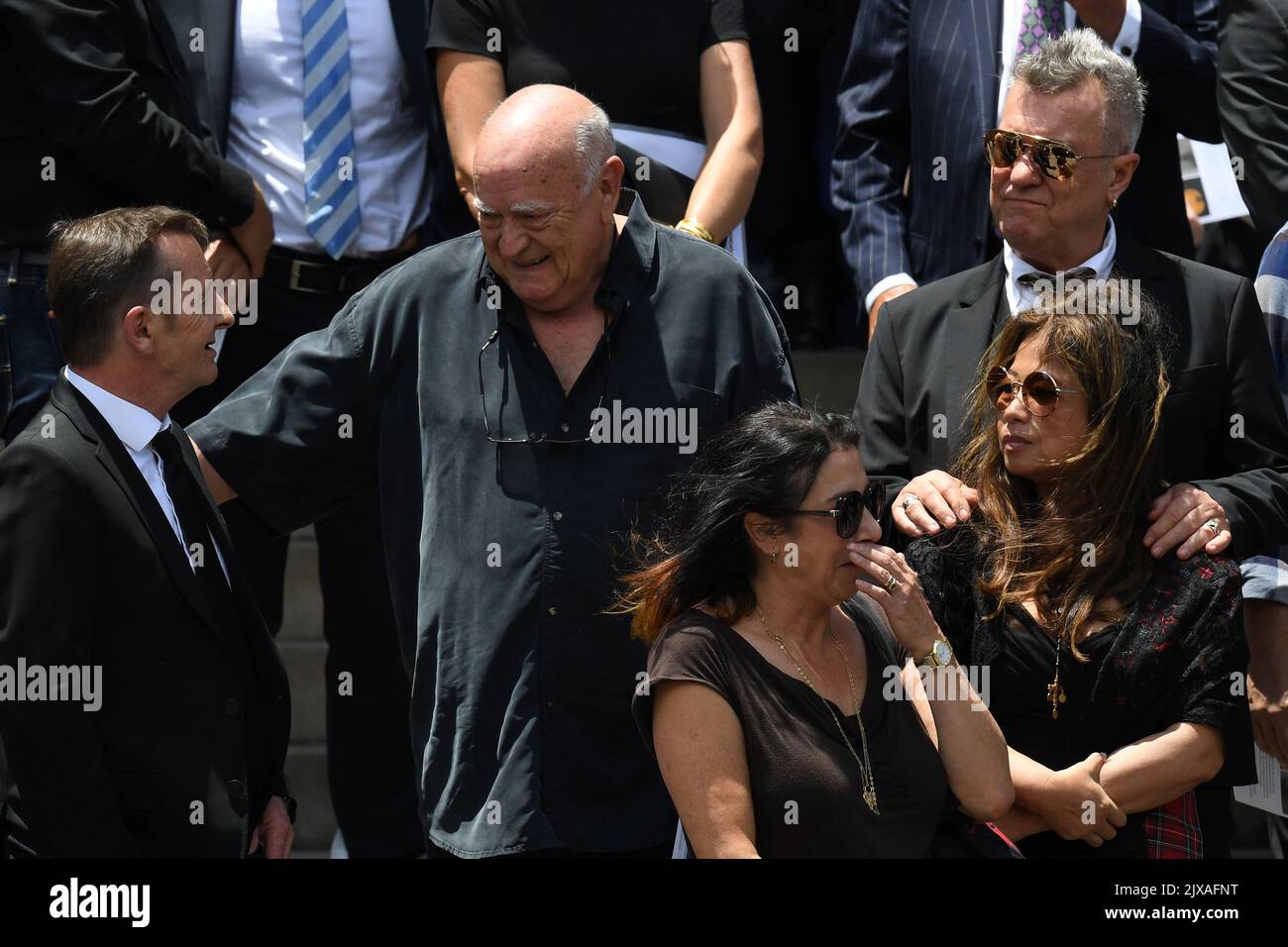 ** CAPTION CORRECTION** Former AC/DC drummer Phil Rudd (left) chats ...