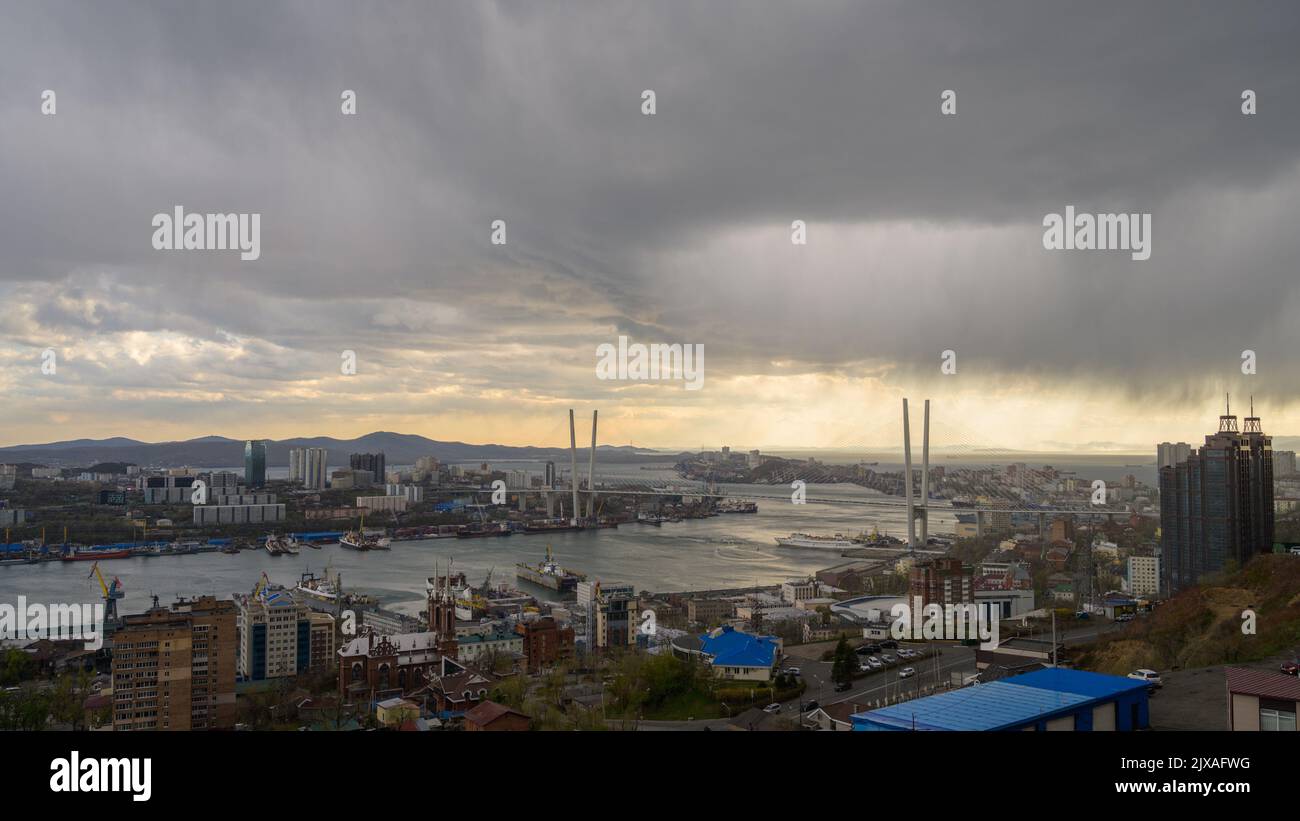 Weather sky storm clouds rain city skyline sunset hi-res stock ...