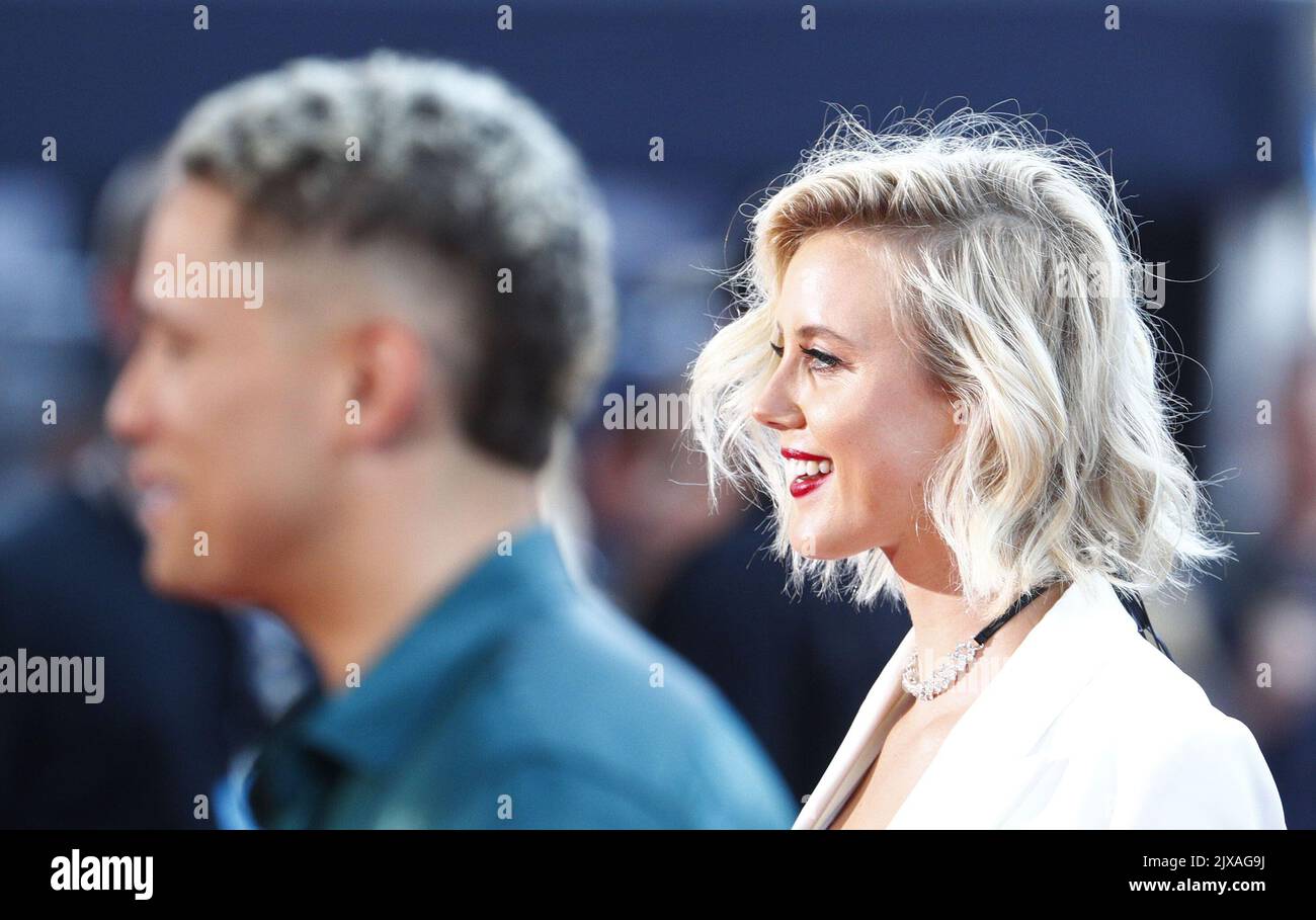 Liv Phyland poses for pictures in front of Nathaniel as she arrives at ...