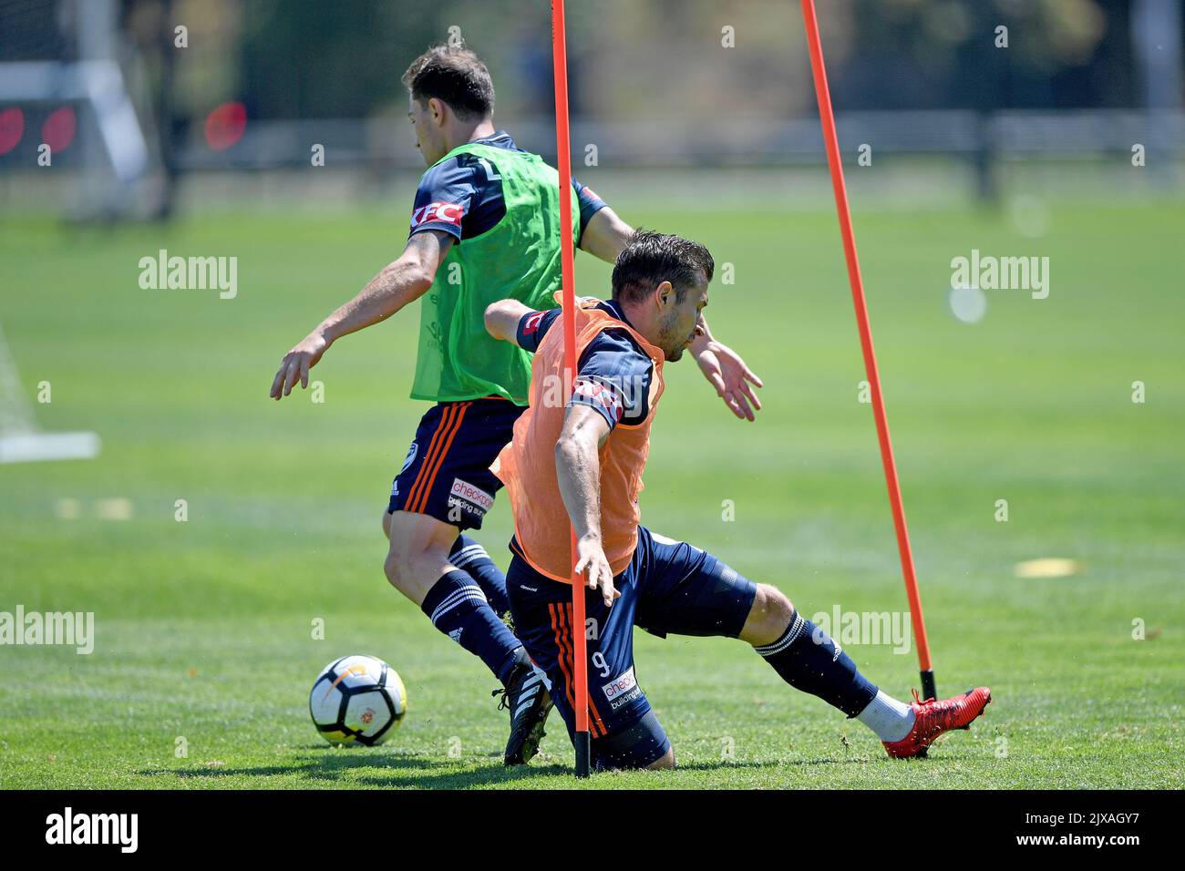 Kosta Barbarouses and James Troisi of Victory contest for the ball ...